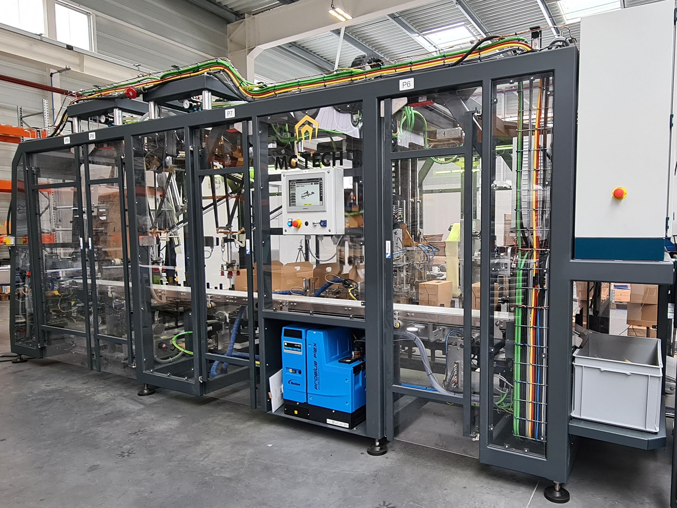 Wrap-around case packer | MG Tech